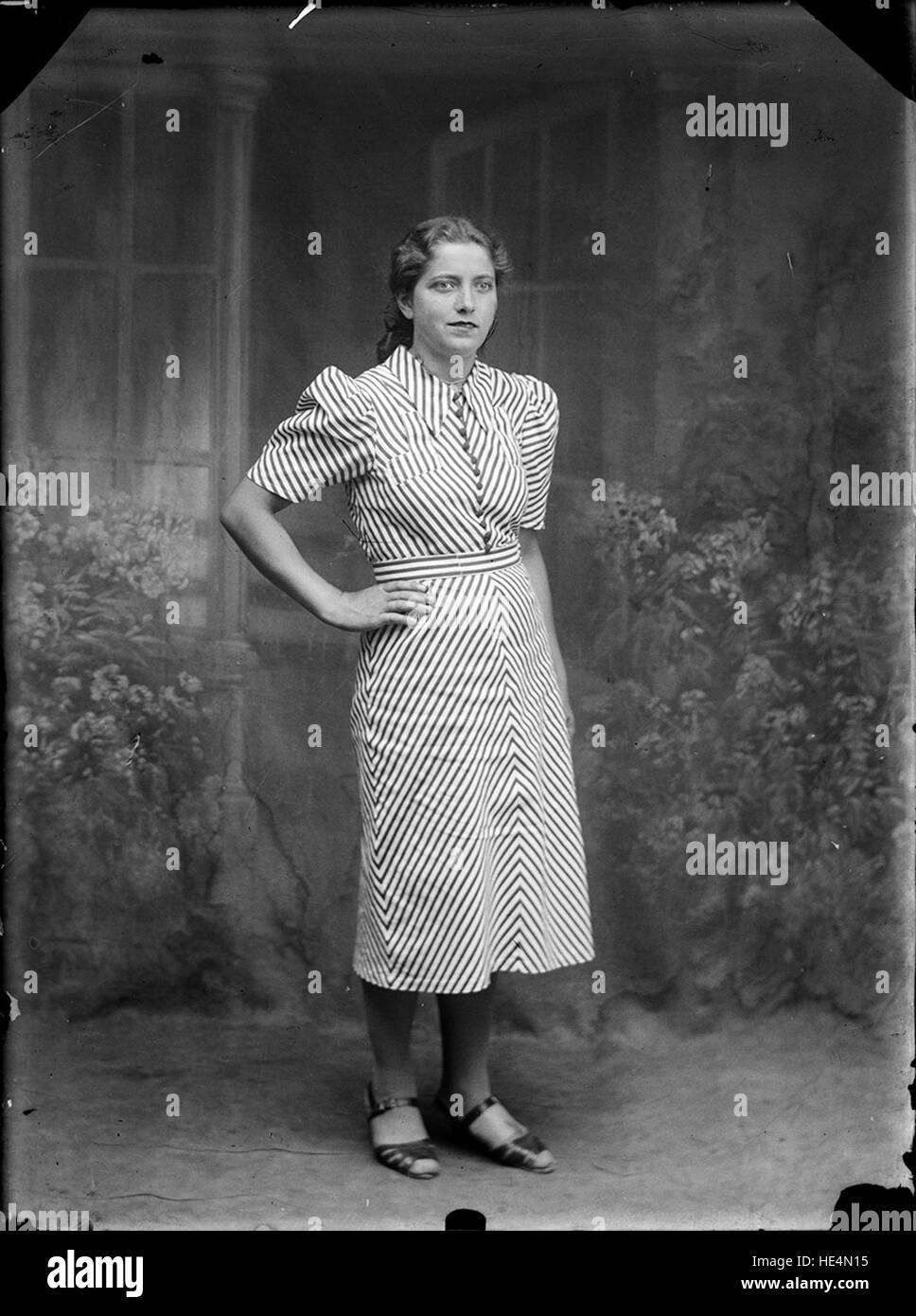 A portrait of a woman from the early 20th century, captured on a glass ...