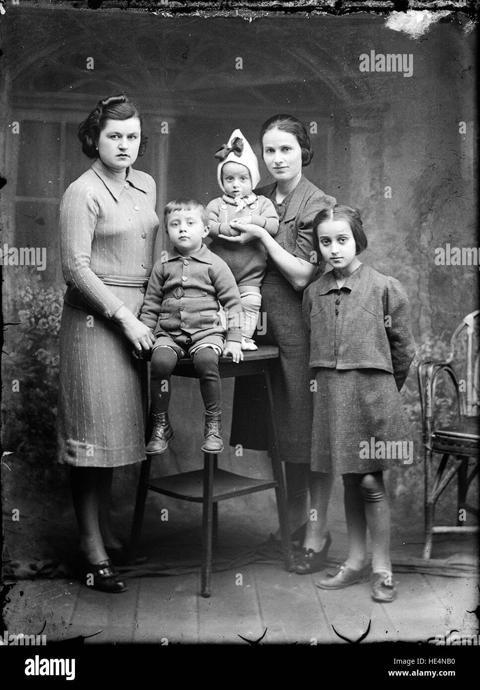 Two women with three children, photographed in rural Romania, capturing ...