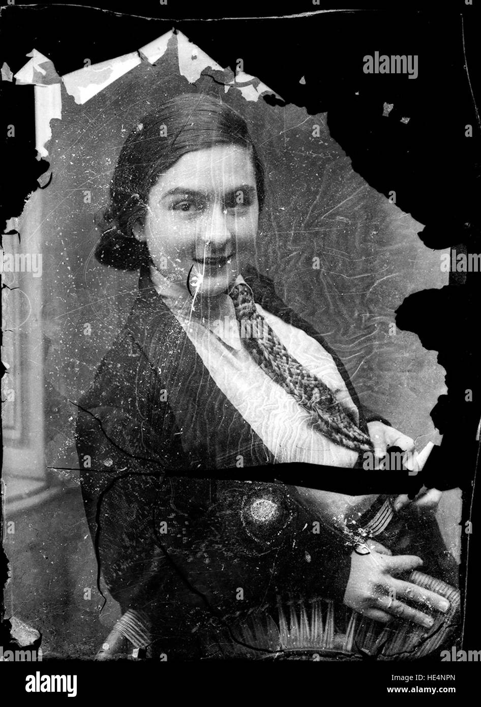 A portrait of a woman captured on a negative glass plate, preserved in ...