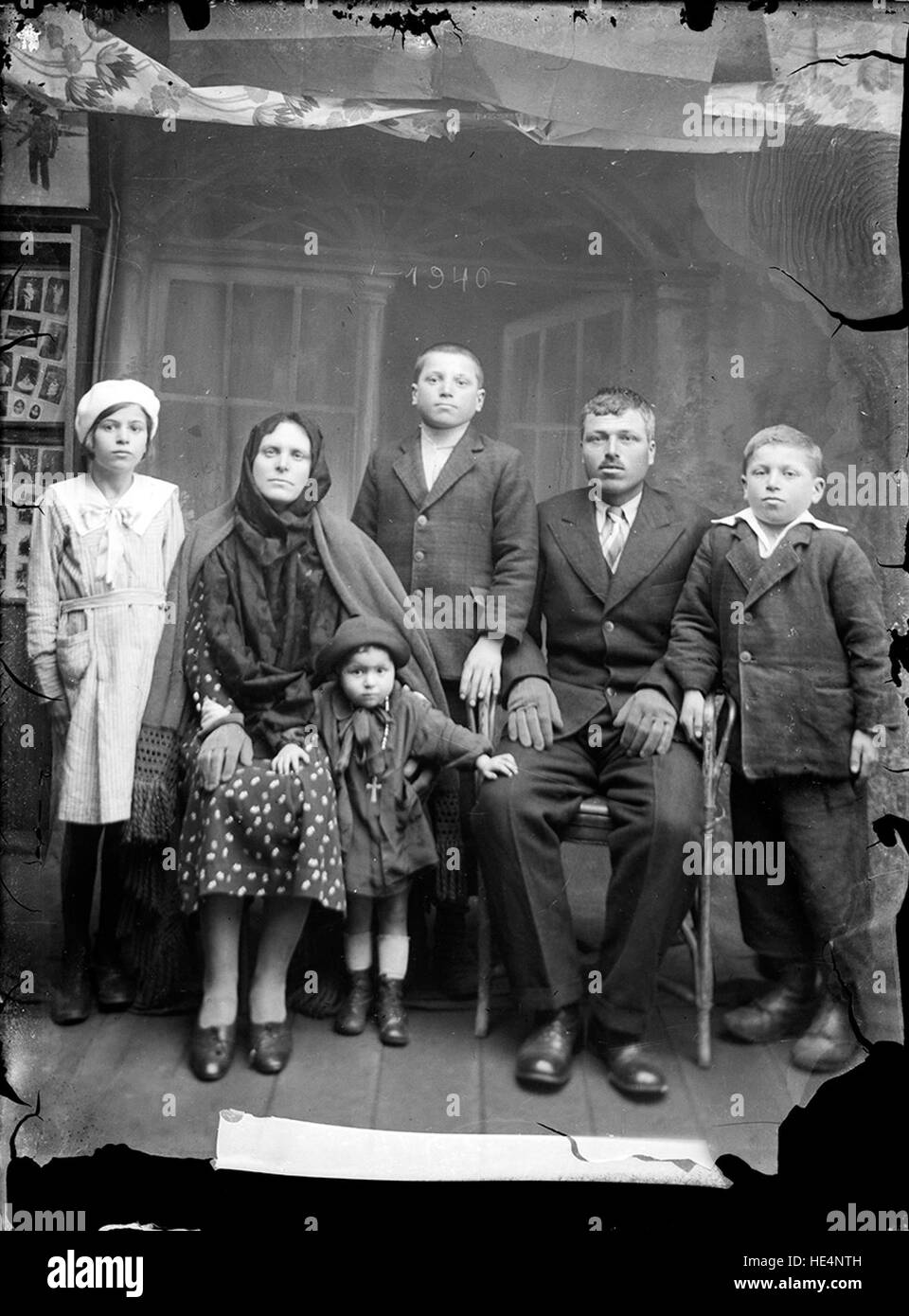 A photograph from 1940 showing a family in rural Romania, captured by ...