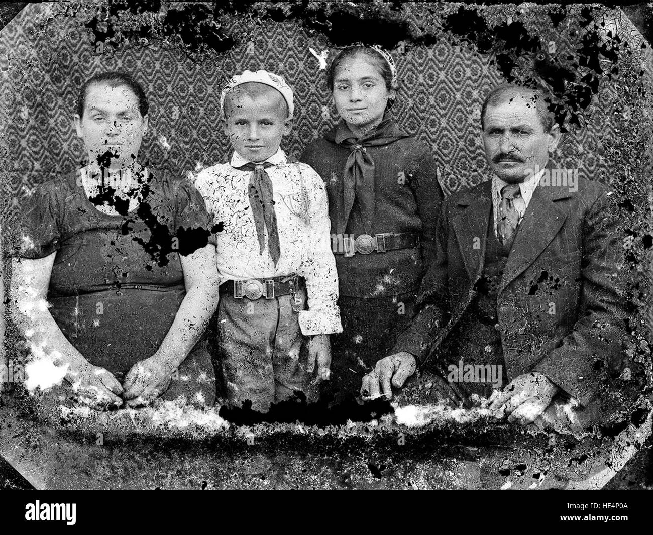 A Romanian family portrait from the early 20th century, captured by ...