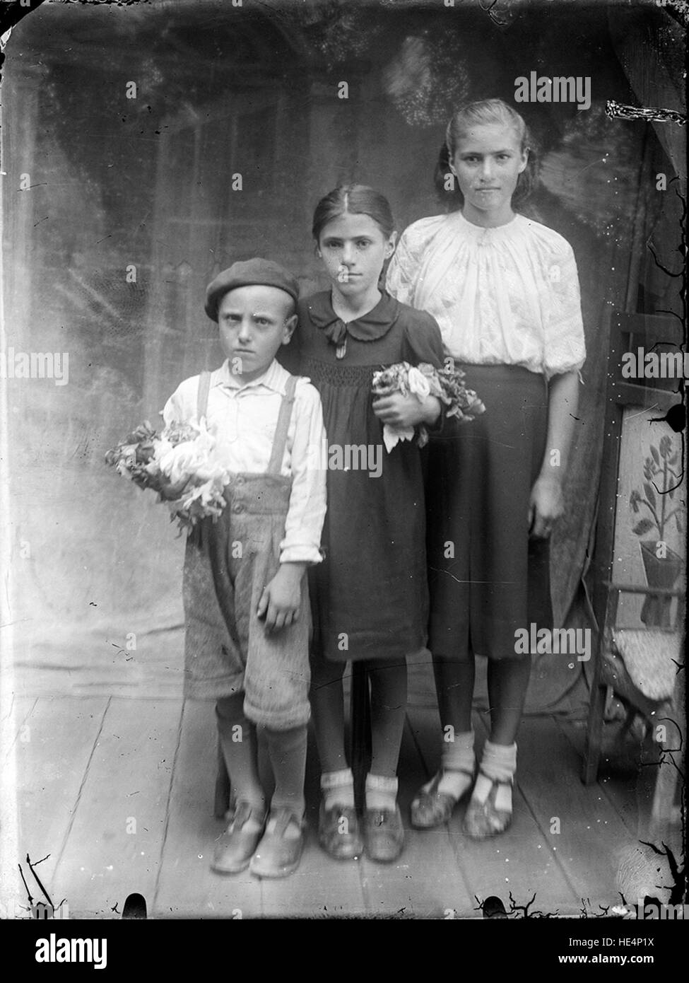 A glass plate portrait of a Romanian family from Ialomita, captured in ...
