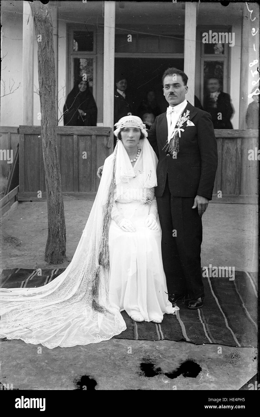 A historical image of a bride and groom, captured on glass plates by ...