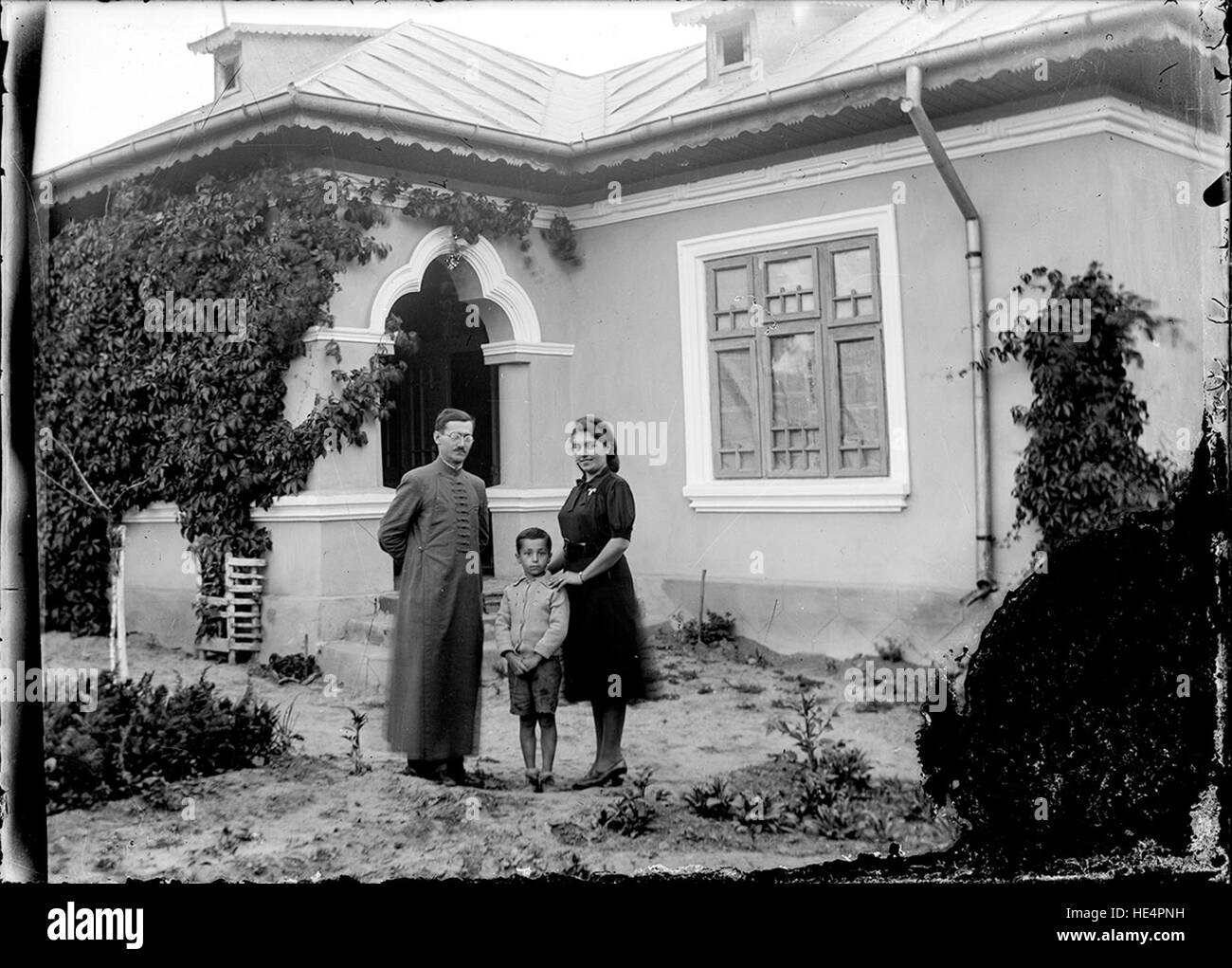 Father Marin Alexandrescu with his wife Ana and eldest son in front of ...