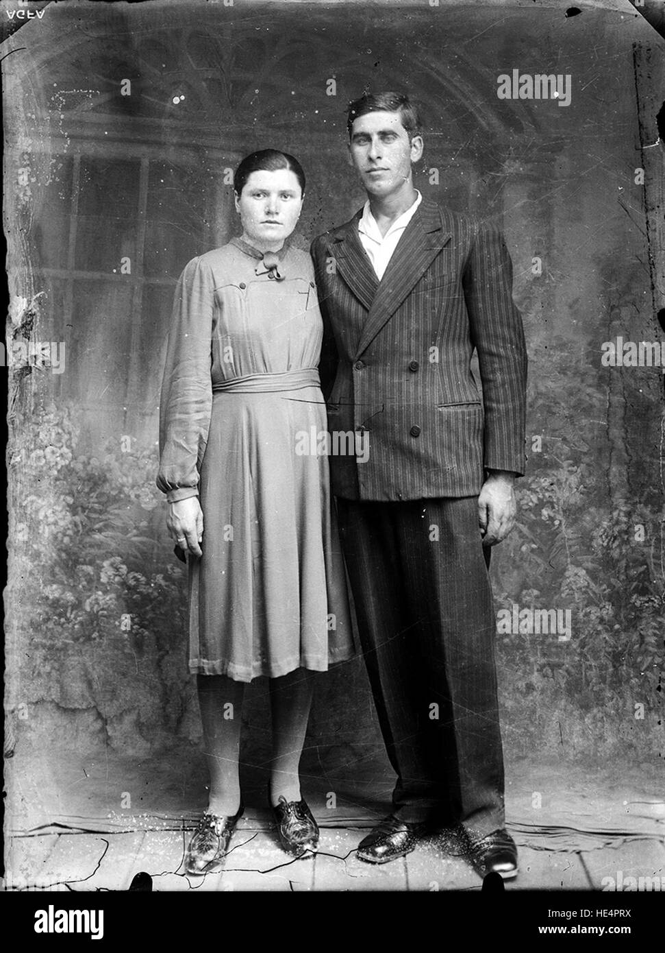 A historic couple captured in an ancient glass plate photograph from ...