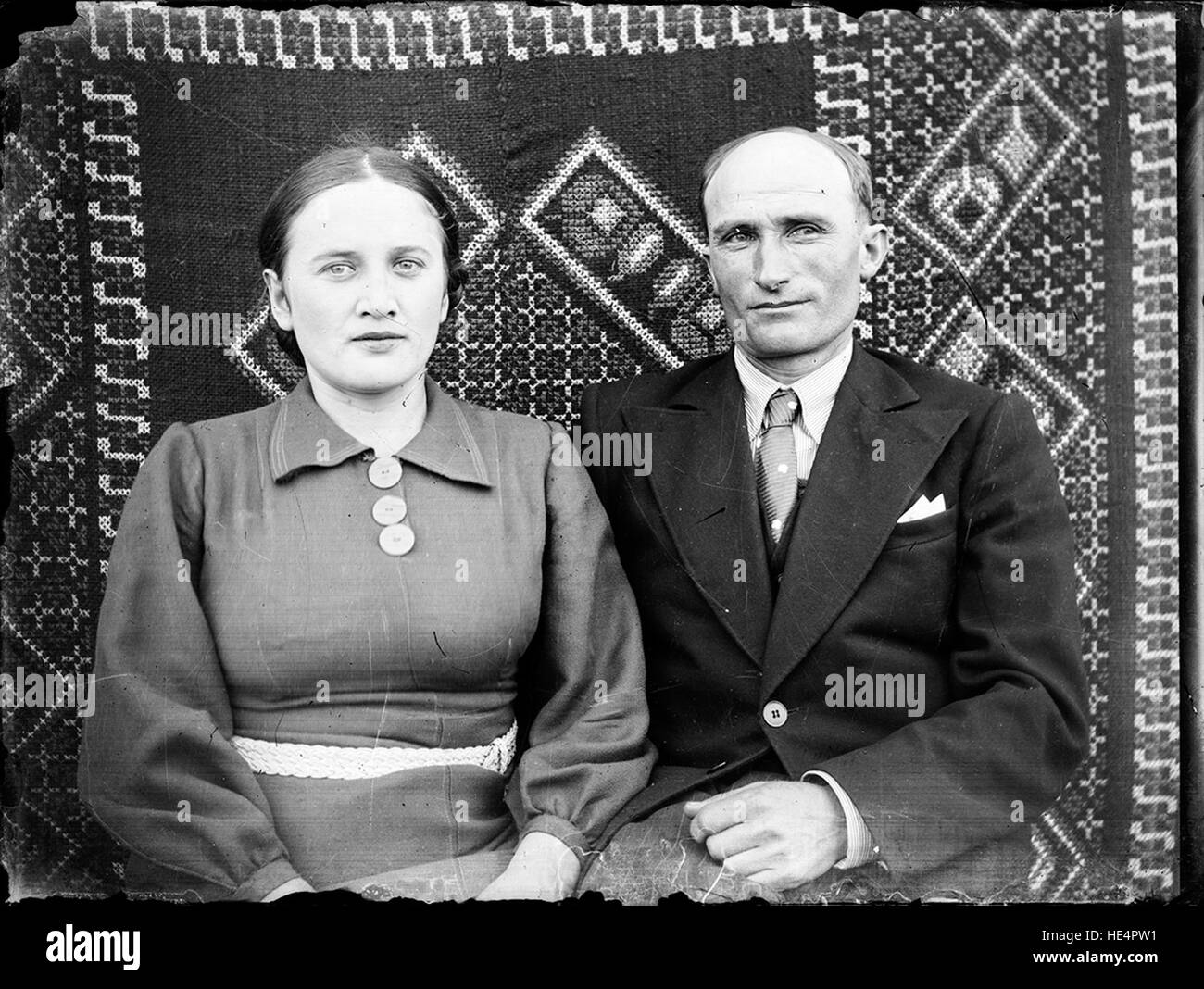 A portrait of a couple from Ialomita, Romania, captured in the mid-20th ...