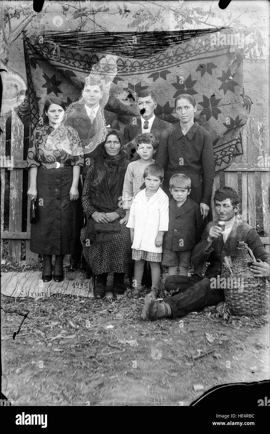 A Romanian family portrait taken in 1935, capturing a moment of rural ...
