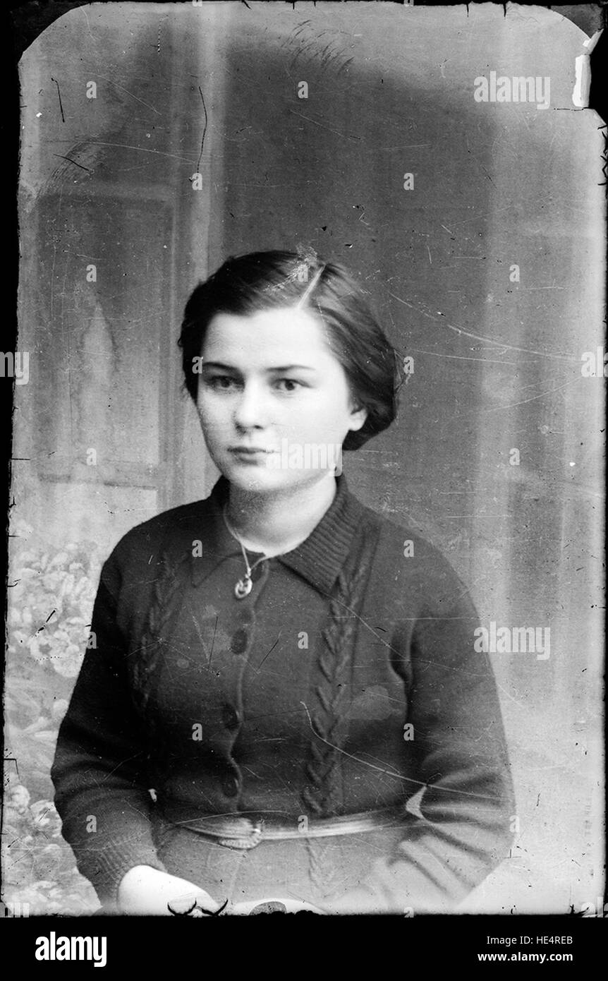A frontal portrait of a woman from Ialomita, Romania, captured by ...