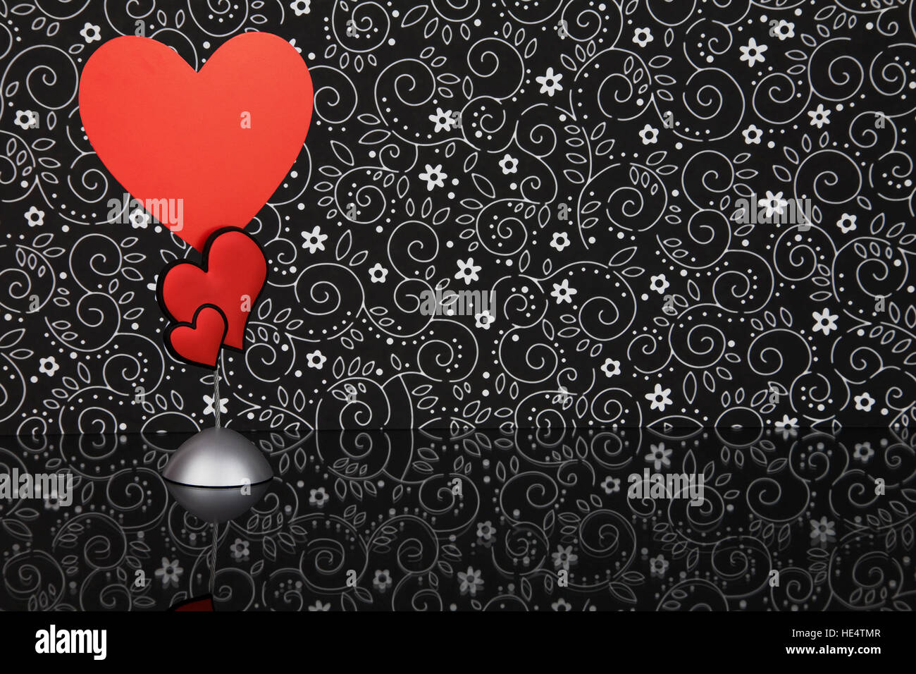 Blank Red Heart shape card with space for copy in the centre and held ...