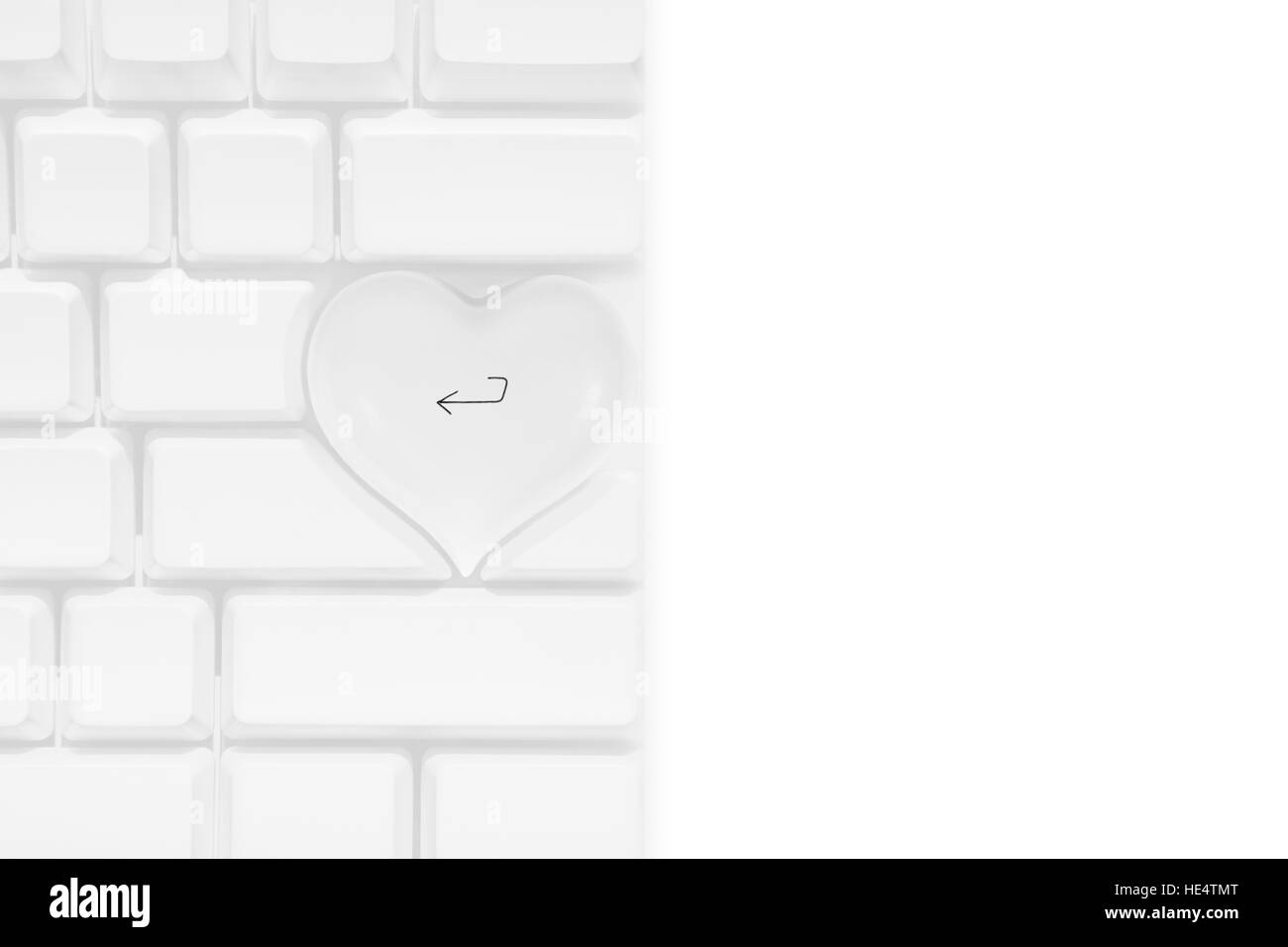 White computer keyboard with a white love heart shaped return key Stock ...