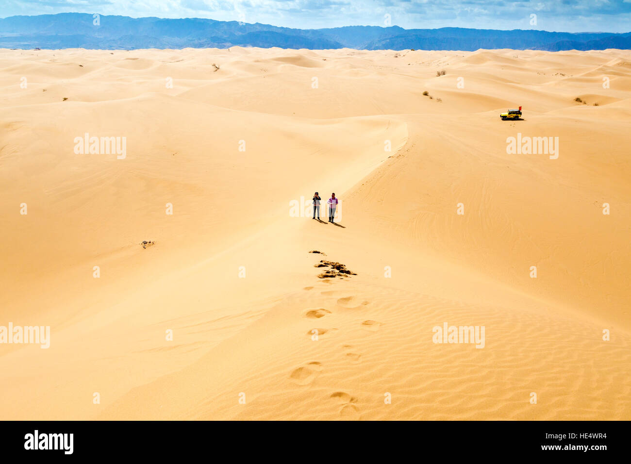 Tourists in the desert at Shapotou Scenic Area, Zhongwei, Ningxia ...