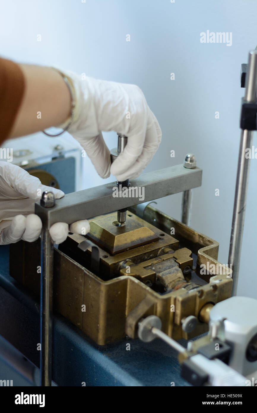 Civil engineer mounting a direct shear test equipment for soil ...