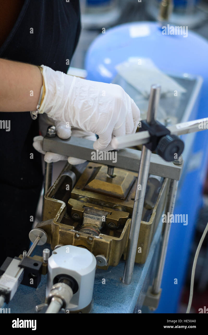 Civil engineer performing a direct shear test for soil parameters ...