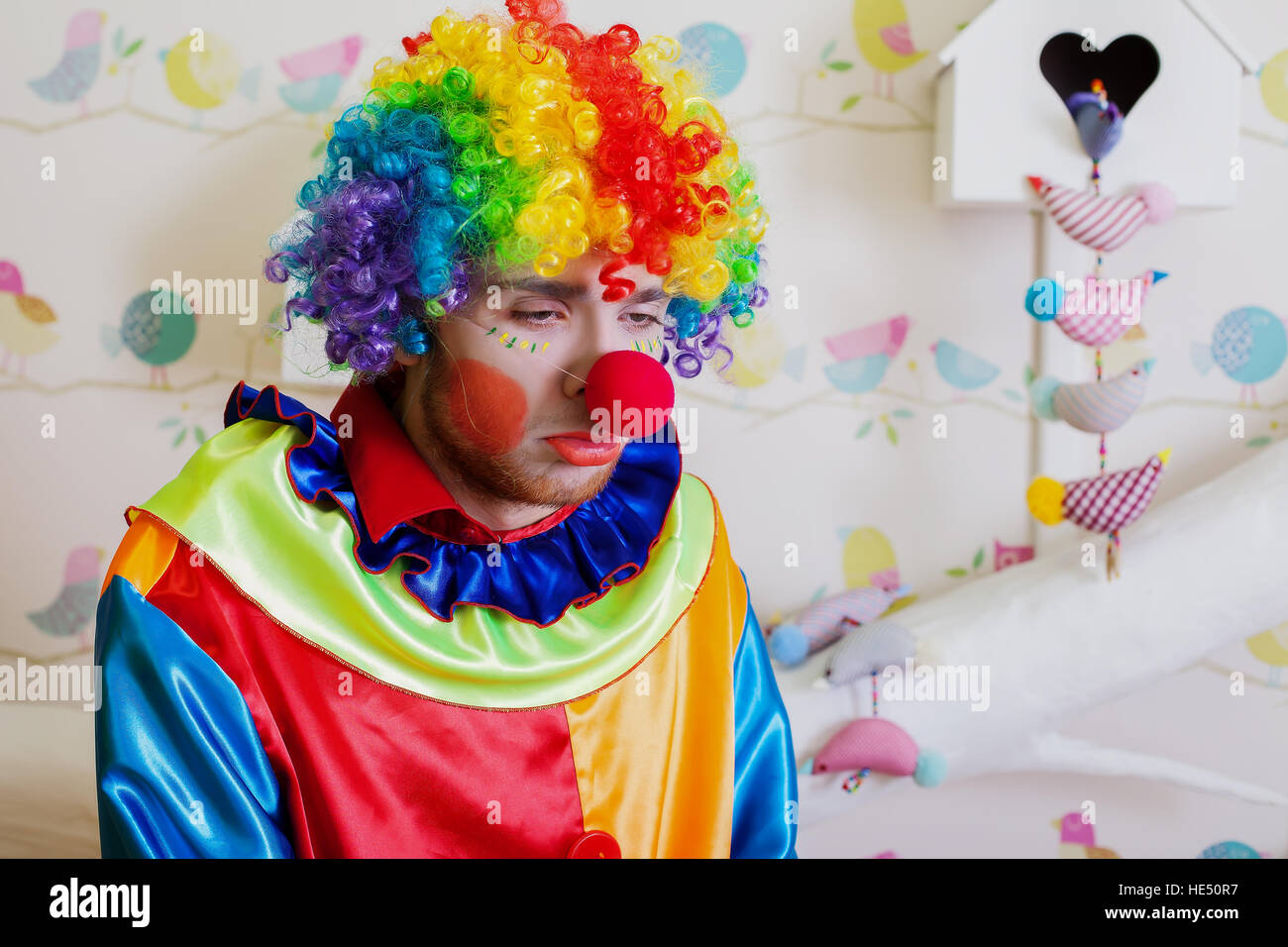 Upset lonely clown Stock Photo - Alamy