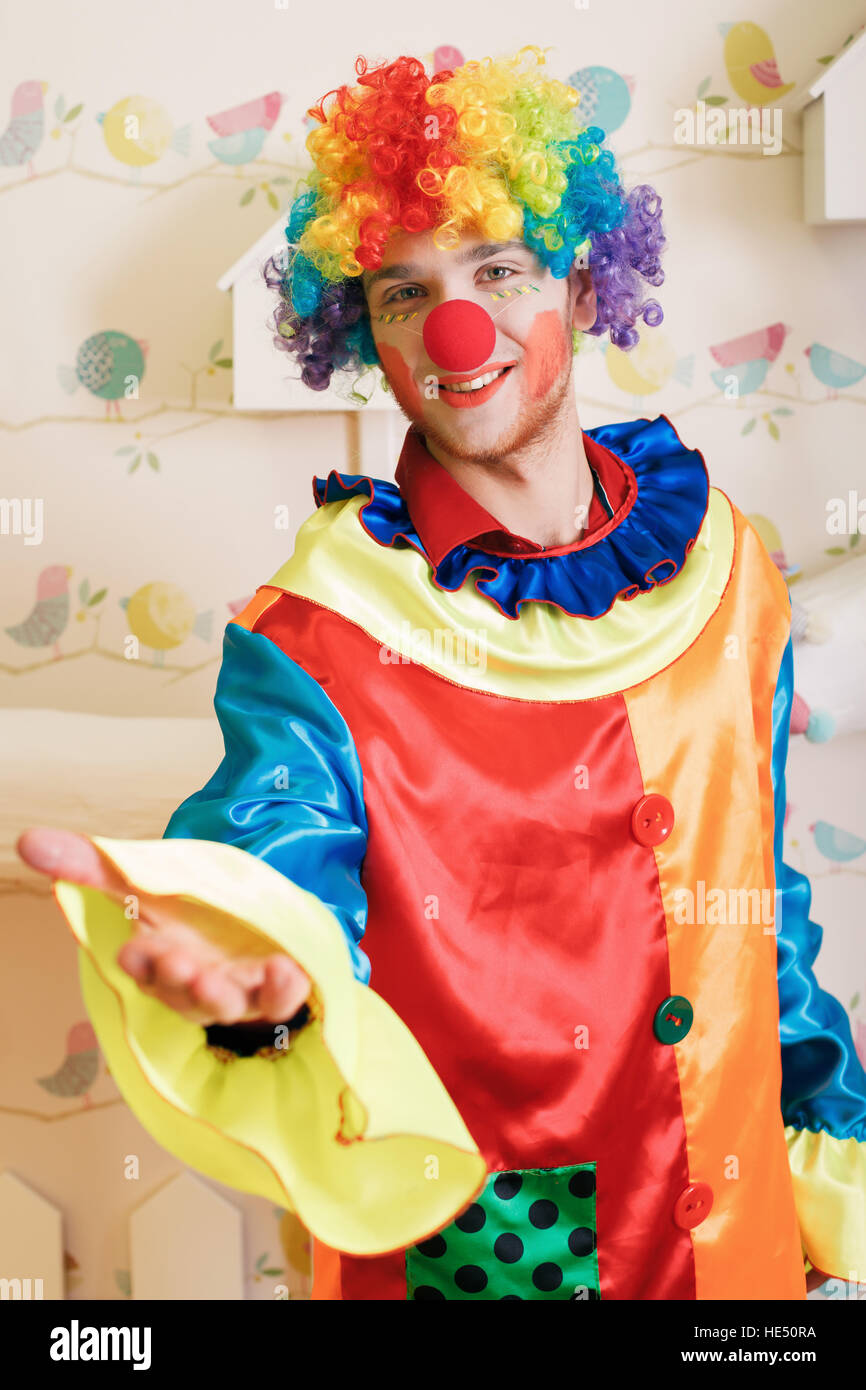 Clown offers friendship Stock Photo - Alamy