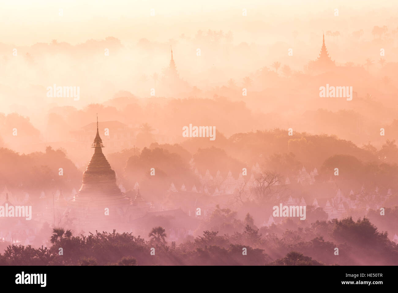 A colourful sunrise with fog in Mandalay, Myanmar Stock Photo - Alamy