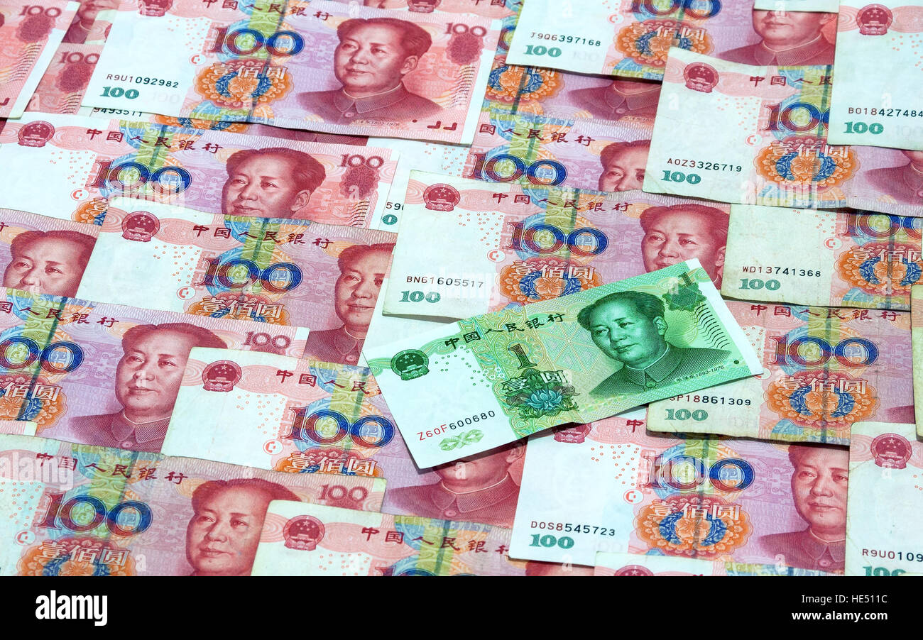Chinese money, banknote one yuan on the background of one hundred yuan ...