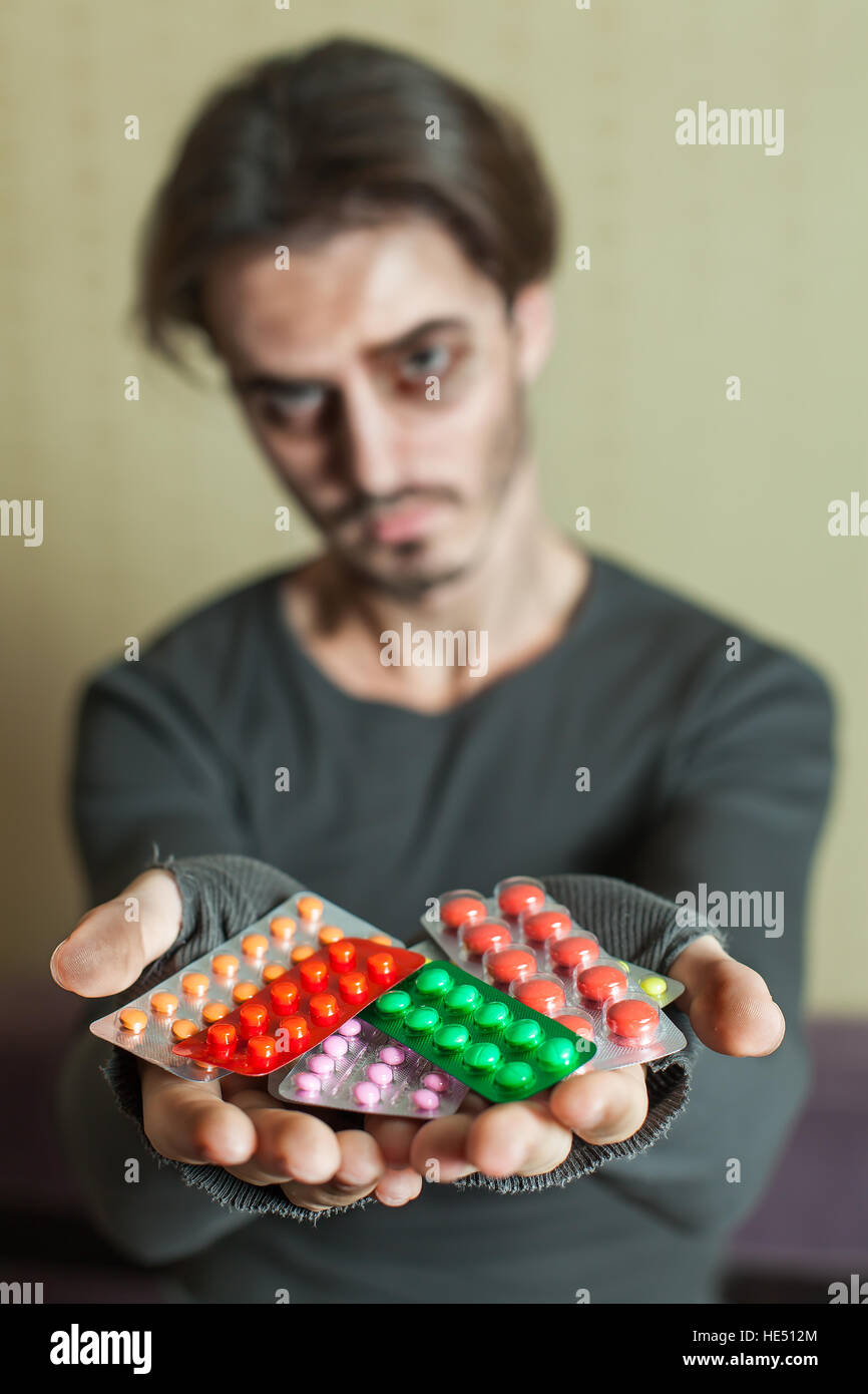 Drugs in hands addict hi-res stock photography and images - Alamy