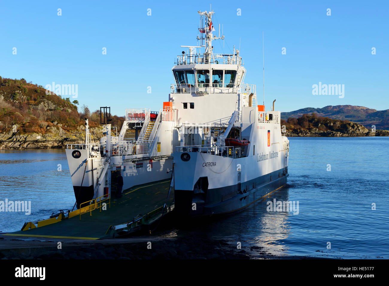 Car and passenger ferry docked at Tarbert harbour on Loch Fyne in ...