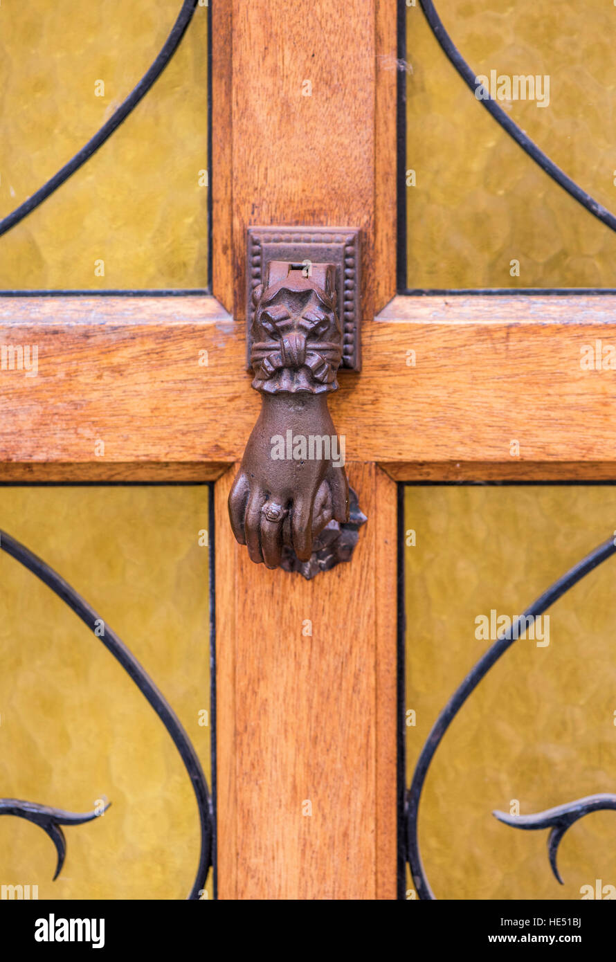 Artistic street door handle Stock Photo - Alamy