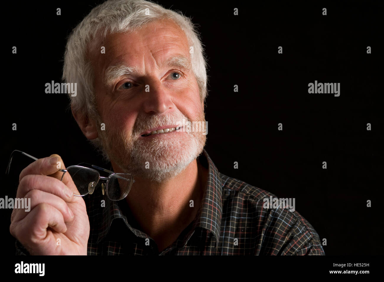 Senior citizen, man, 60 +, portrait, holding his glasses in his hand ...