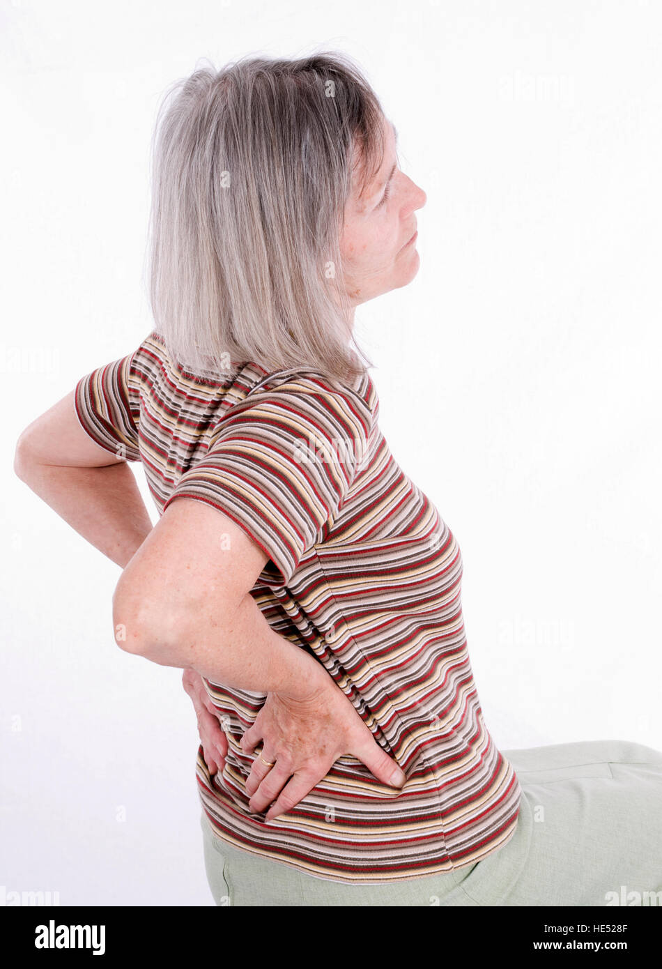 Elderly woman, older than 65 years, suffering from back pain Stock ...
