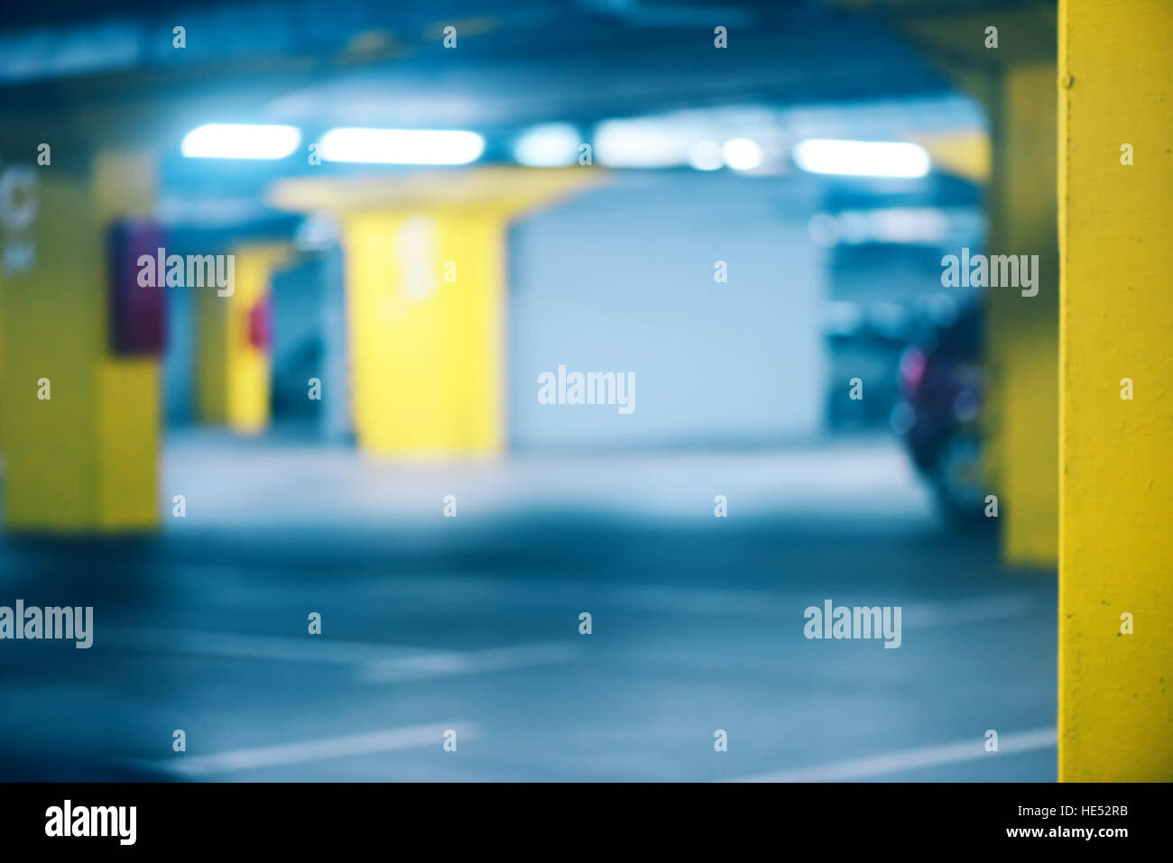 Underground garage parking lot, blur abstract defocussed modern ...