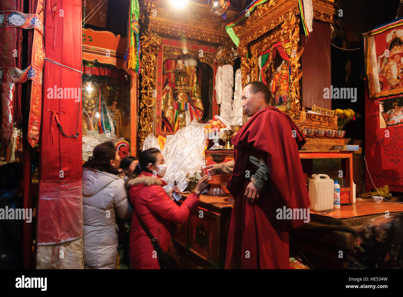 Tibetans pray in a chapel hi-res stock photography and images - Alamy