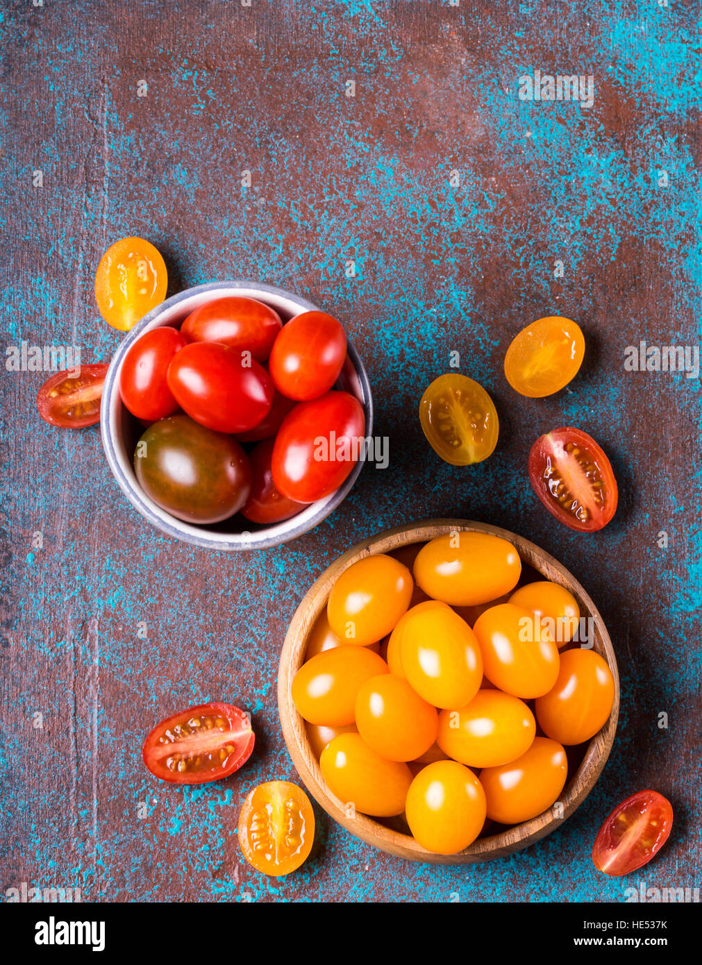 Bright orange and red cherry tomatoes Stock Photo - Alamy