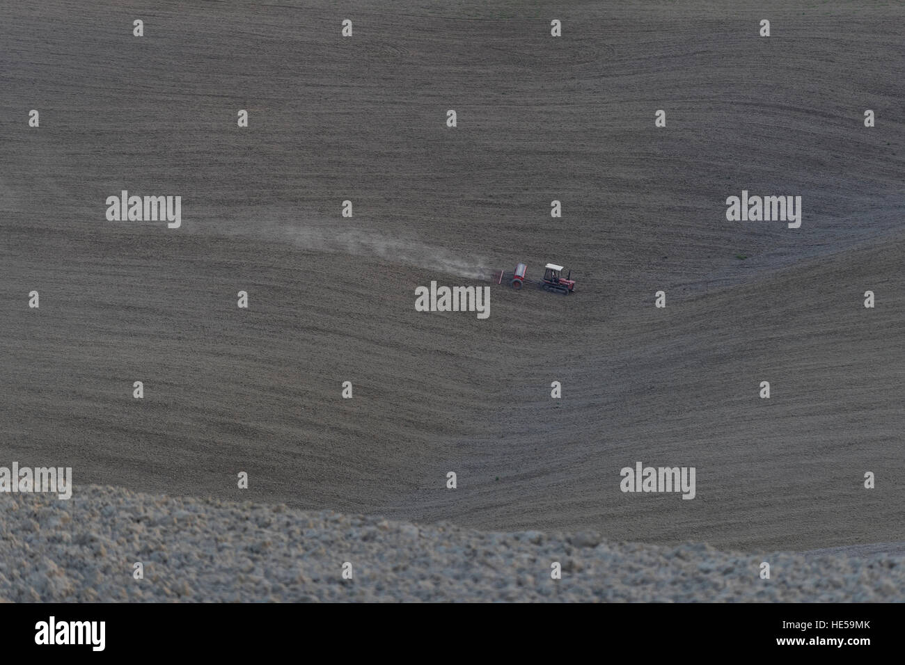 The thin soils of Tuscany ploughed at steep angles. Tuscan hills near ...