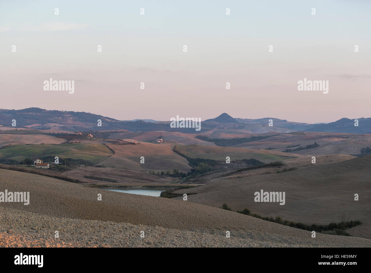 The thin soils of Tuscany ploughed at steep angles. Tuscan hills near ...