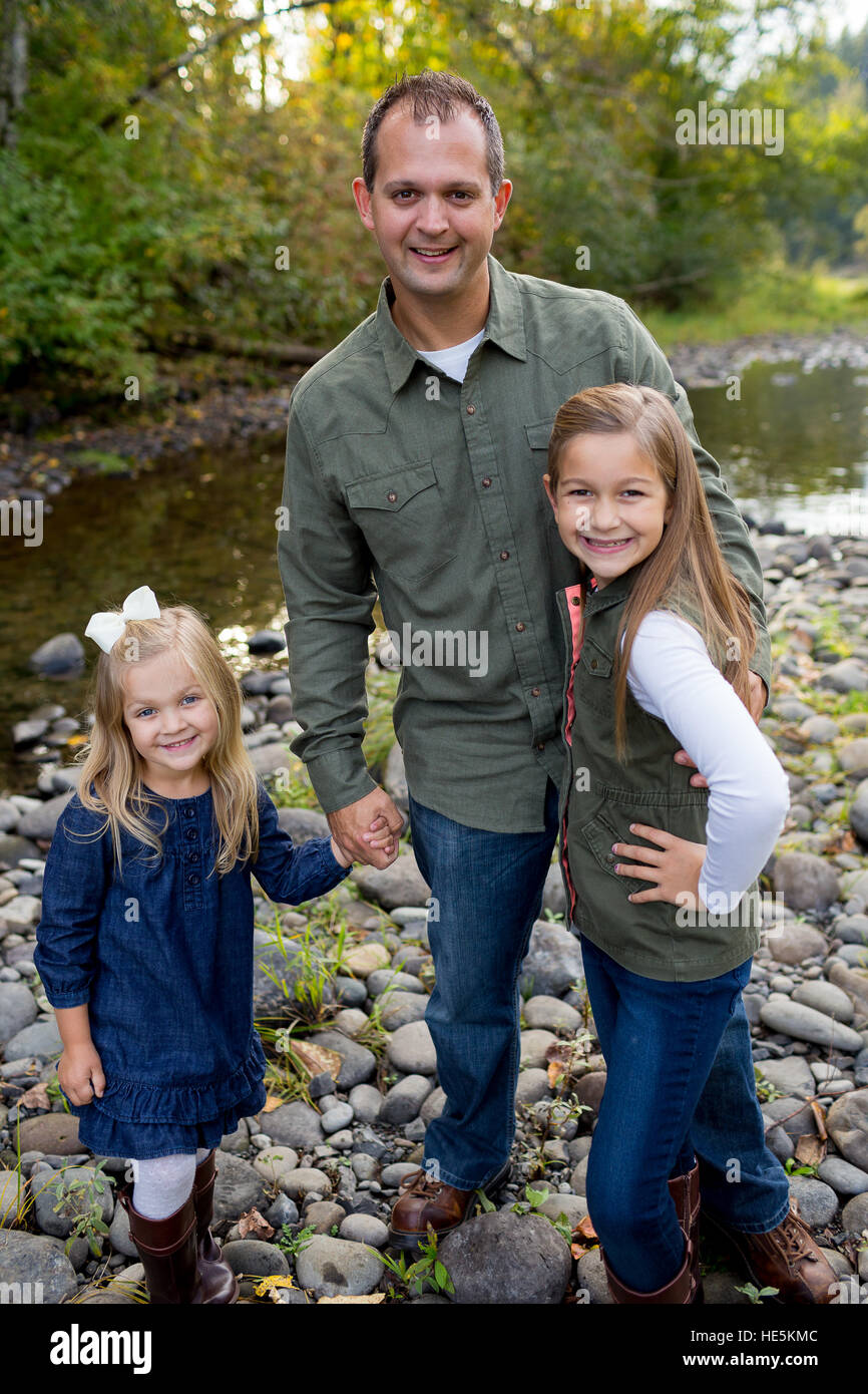 Dad with two daughters hi-res stock photography and images - Alamy