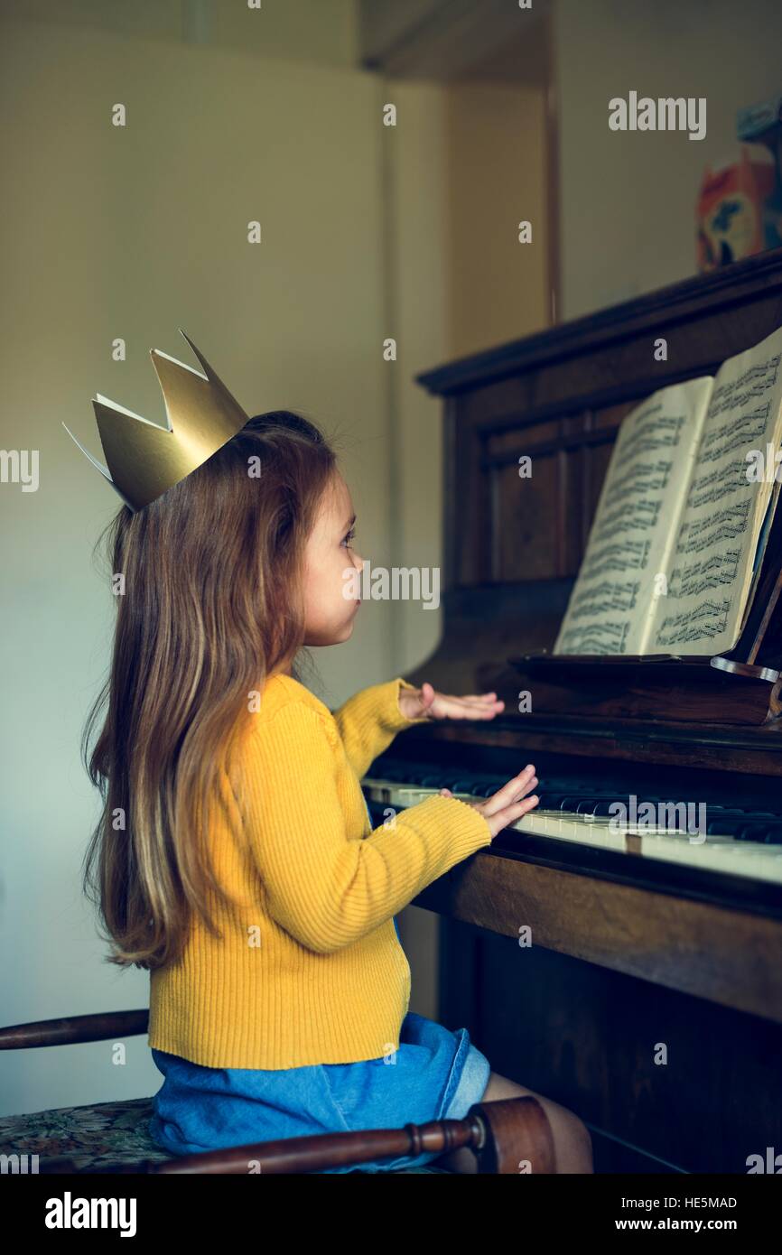 Adorable Cute Girl Playing Piano Concept Stock Photo - Alamy