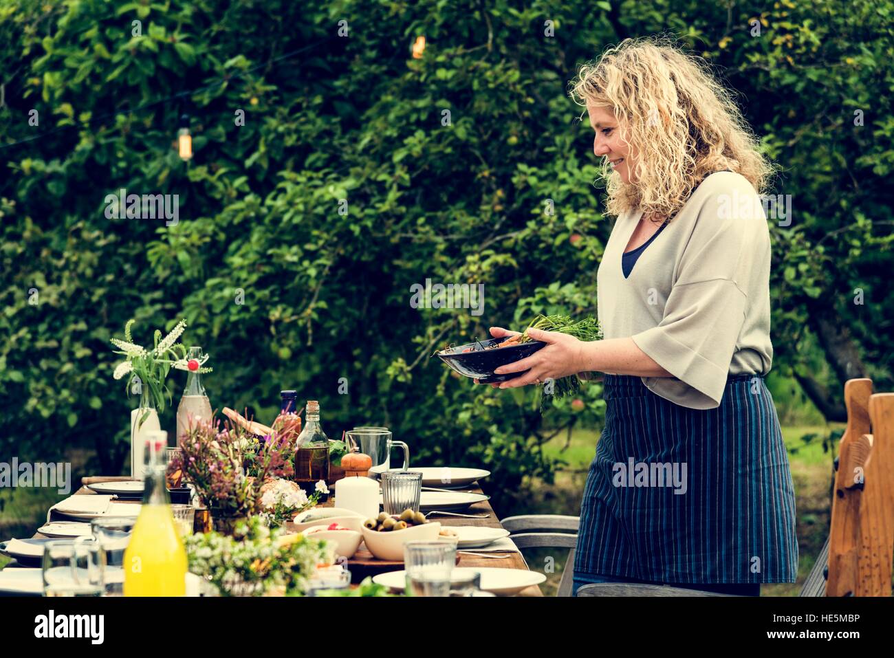 Woman Preparing Table Dinner Concept Stock Photo - Alamy