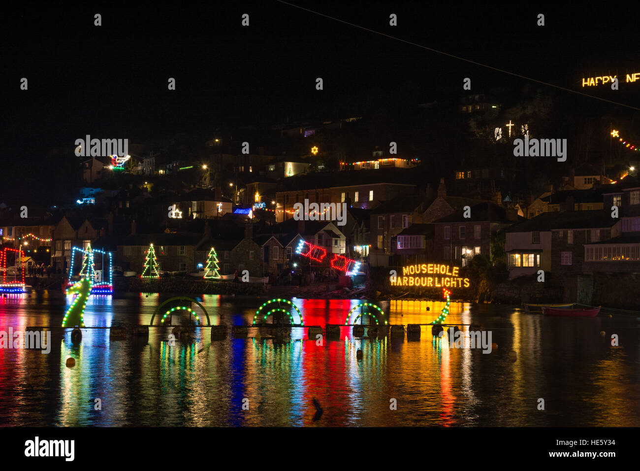 Mousehole, Cornwall, UK. 17th December 2016. Thousands of people pack ...