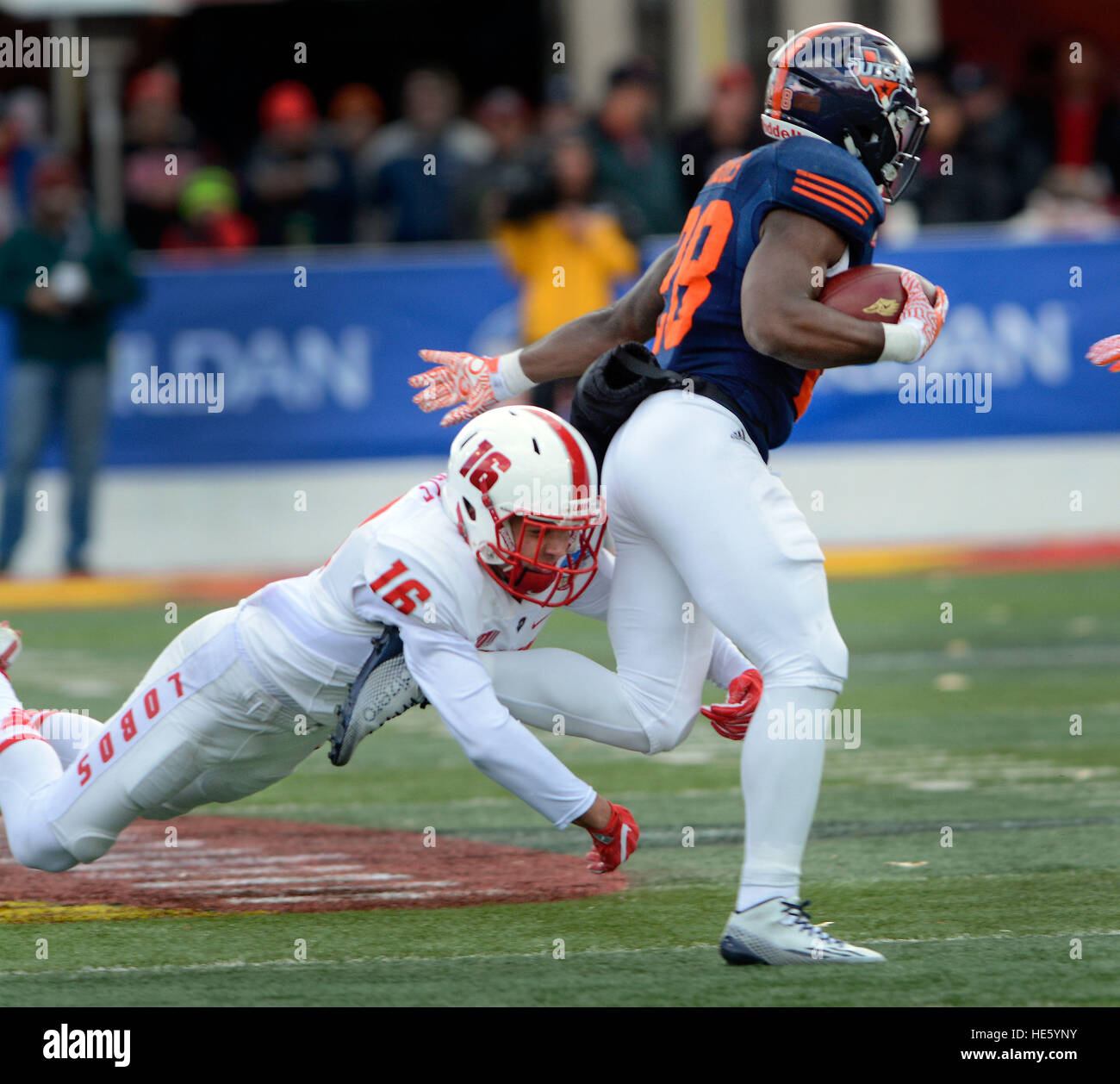 Albuquerque, NM, USA. 17th Dec, 2016. UNM's #16 Jacob Girgle tackles ...