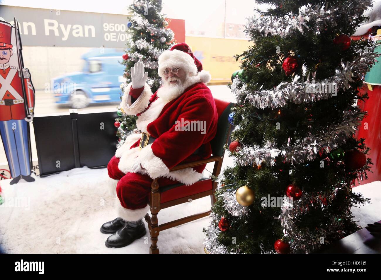 Chicago, USA. 17th Dec, 2016. A train staff dressed as Santa Claus ...