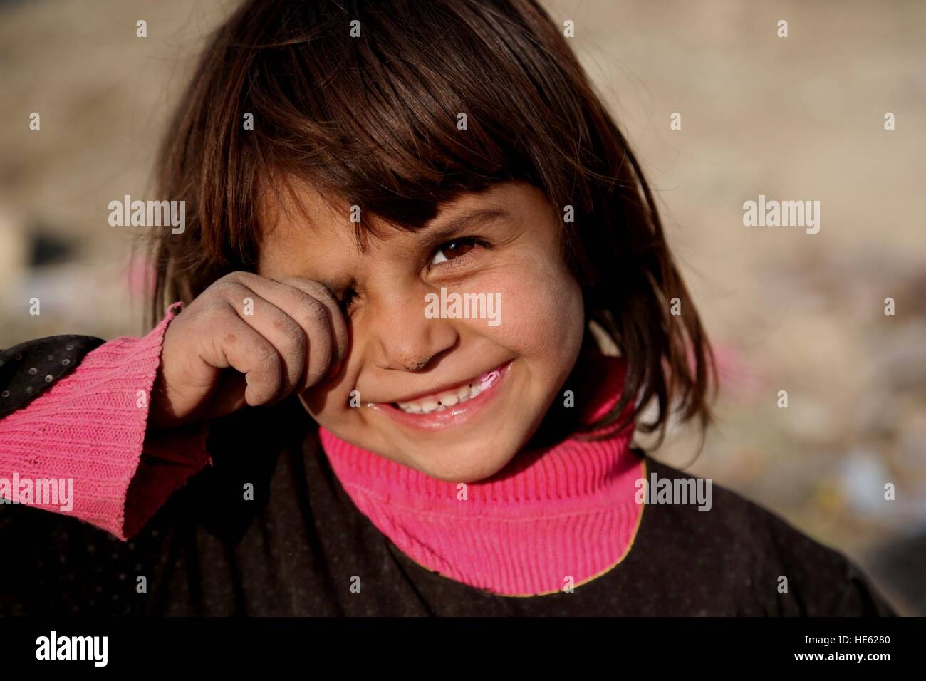 Kabul, Afghanistan. 18th Dec, 2016. An Afghan displaced child poses for ...
