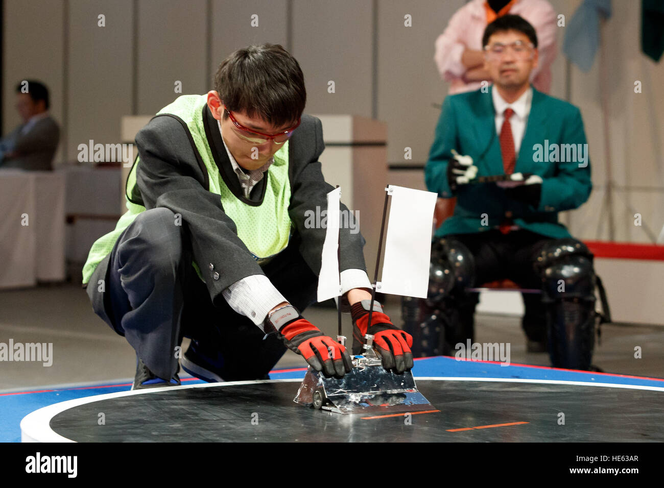 Tokyo, Japan. 18th Dec, 2016. An international robot operator competes ...