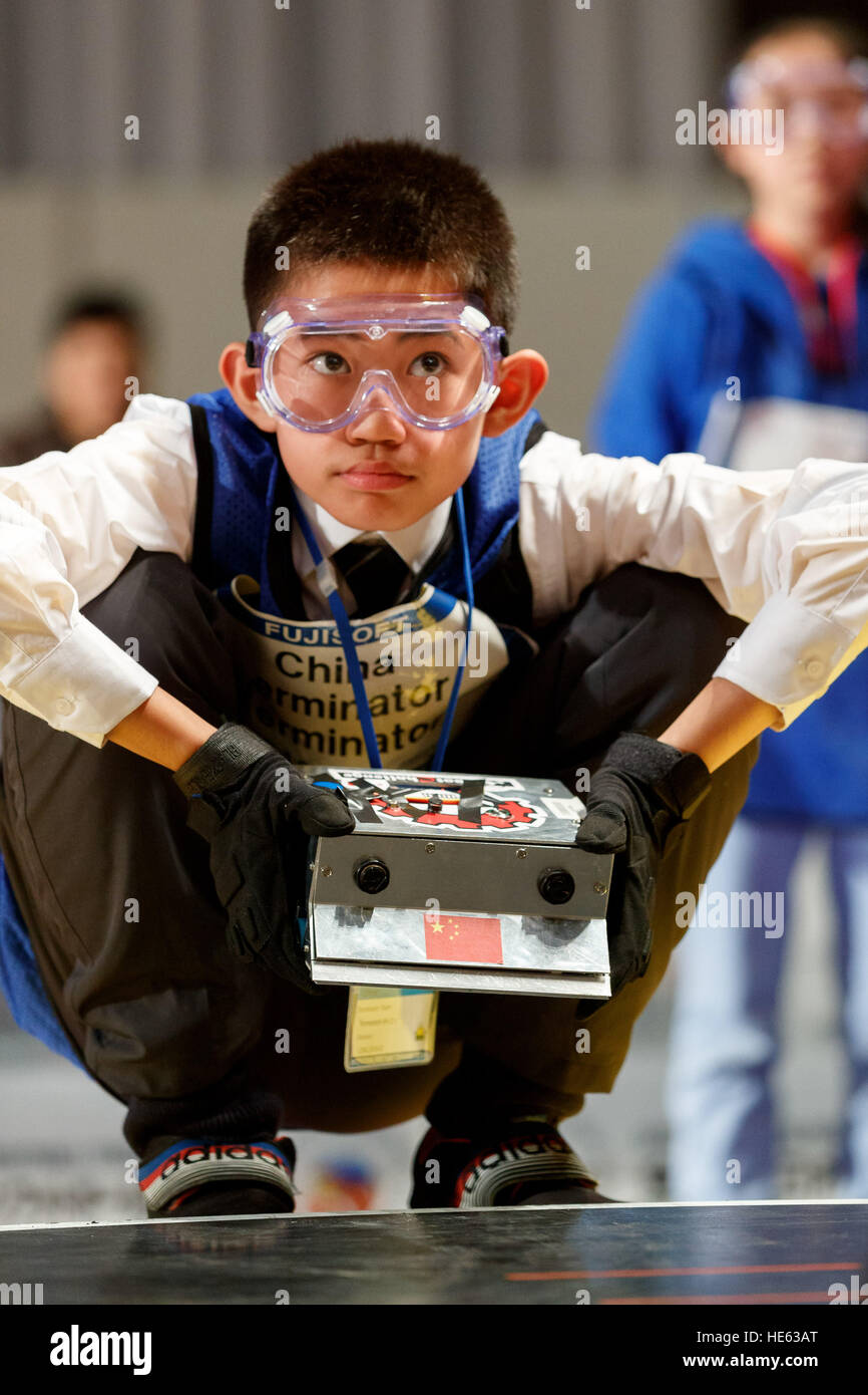 Tokyo, Japan. 18th Dec, 2016. An international robot operator competes ...