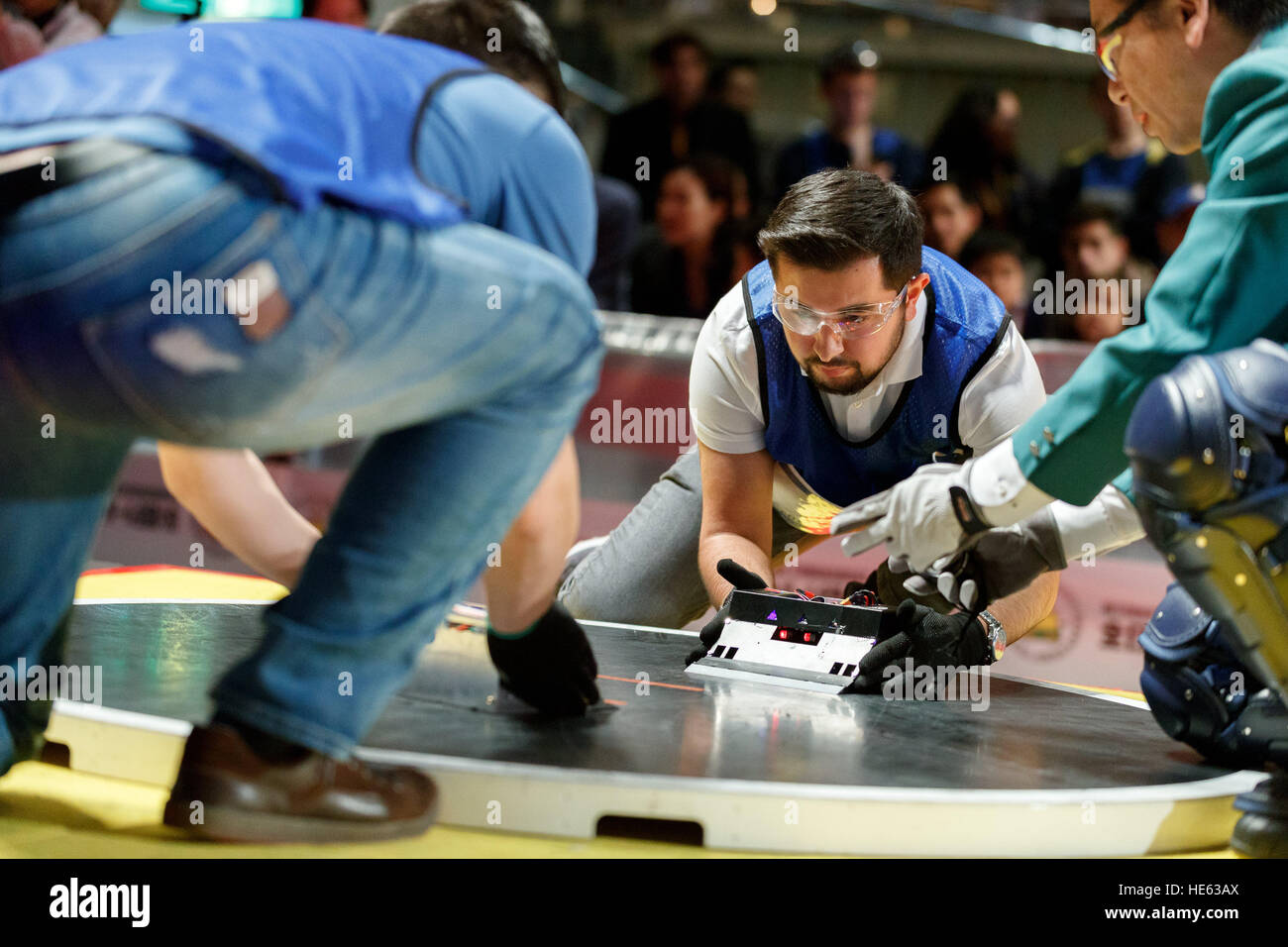 Tokyo, Japan. 18th Dec, 2016. International robot operators compete to ...