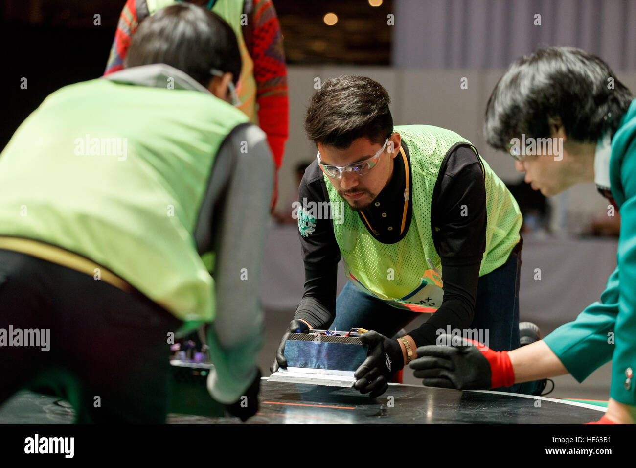 Tokyo, Japan. 18th Dec, 2016. International robot operators compete to ...
