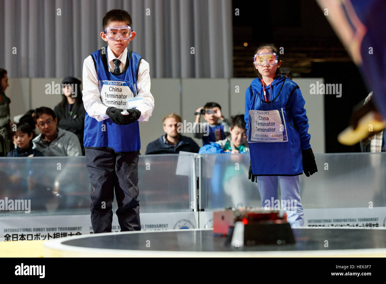 Tokyo, Japan. 18th Dec, 2016. International robot operators compete to ...
