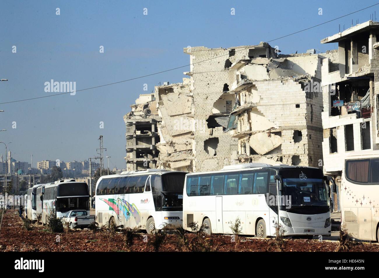 Aleppo buses evacuation hi-res stock photography and images - Alamy