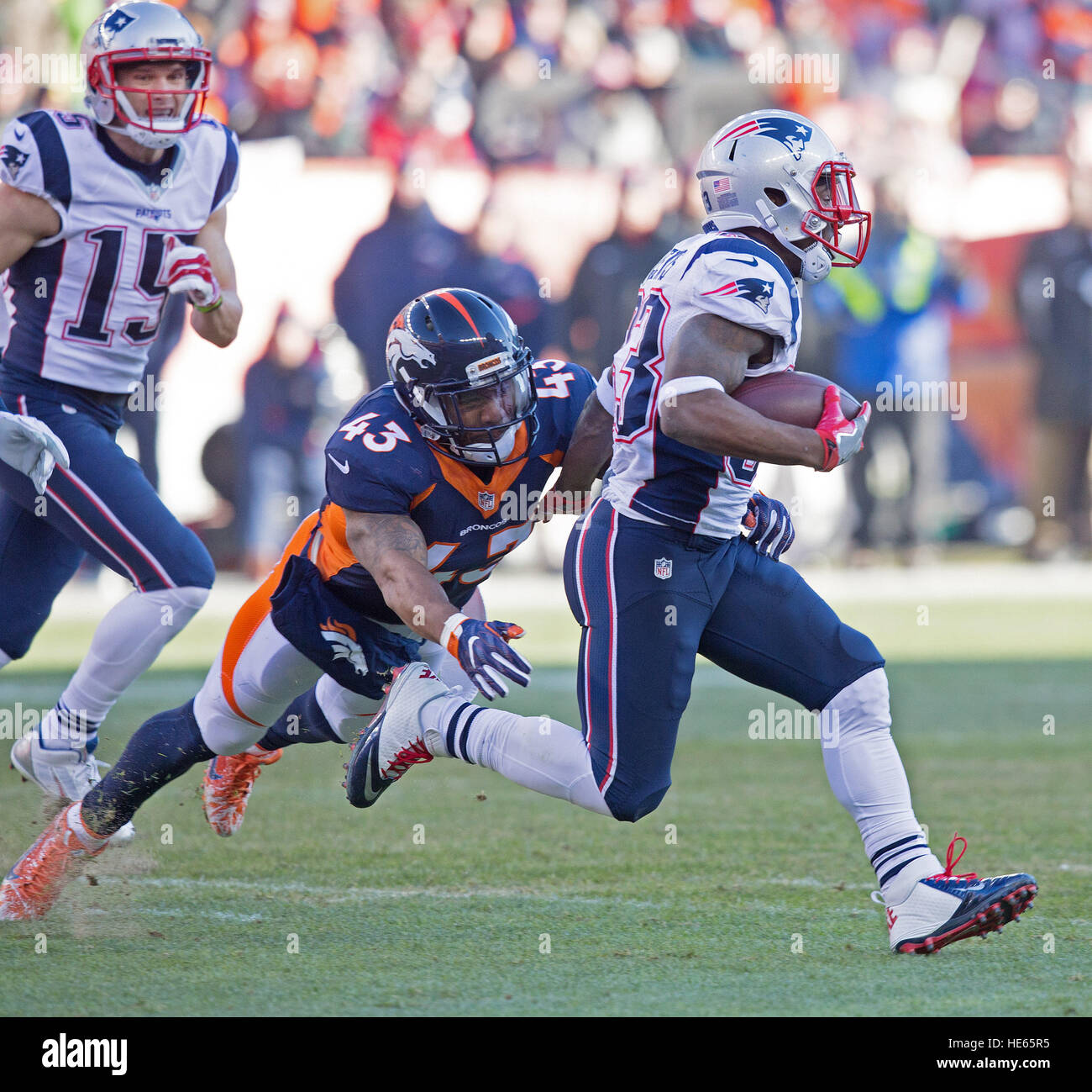 Denver, Colorado, USA. 18th Dec, 2016. Patriots RB DION LEWIS, right ...