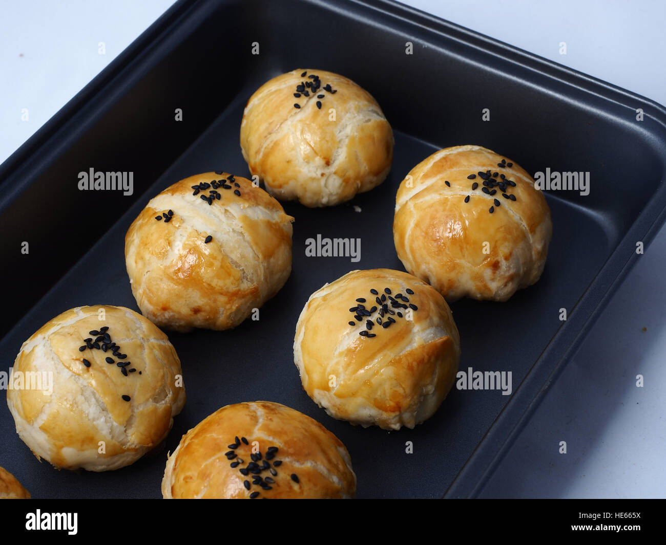 China. 17th Dec, 2016. Egg Yolk Puff is a special Chinese snack made ...