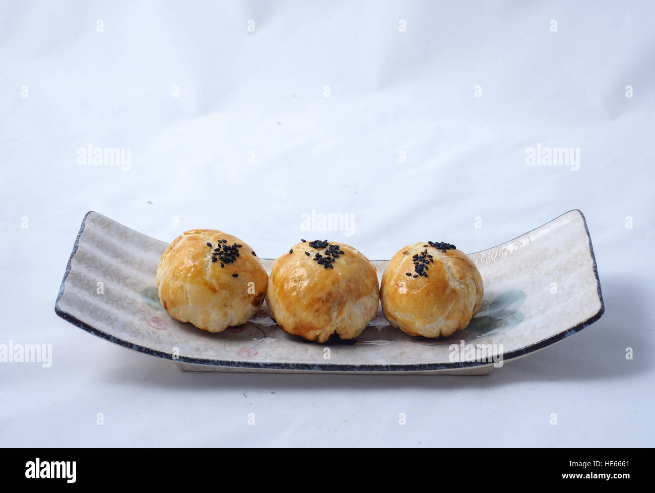 China. 17th Dec, 2016. Egg Yolk Puff is a special Chinese snack made ...
