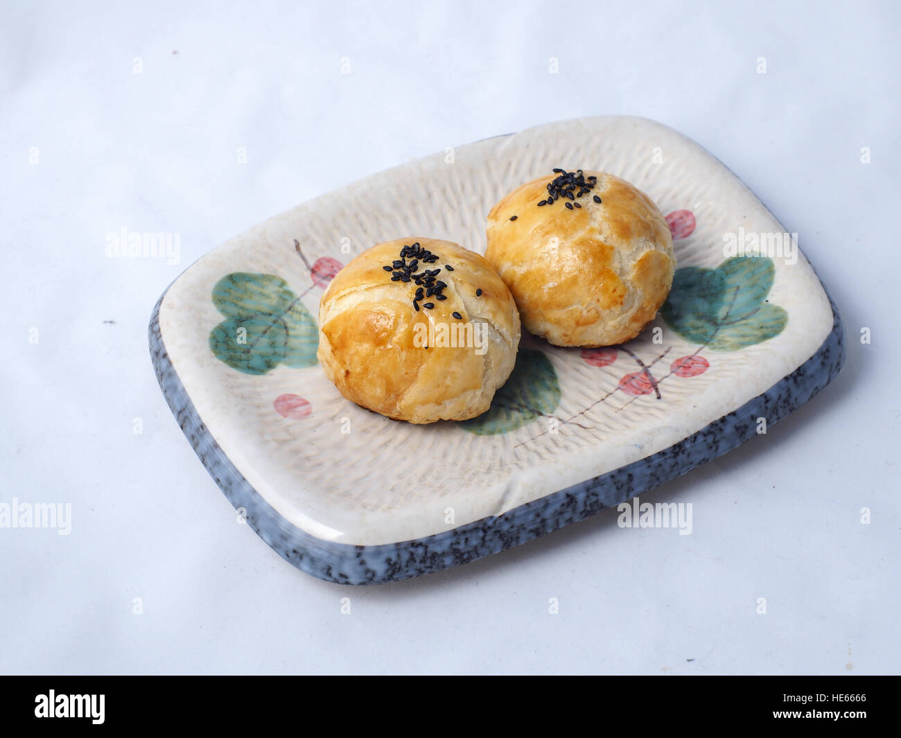 China. 17th Dec, 2016. Egg Yolk Puff is a special Chinese snack made ...