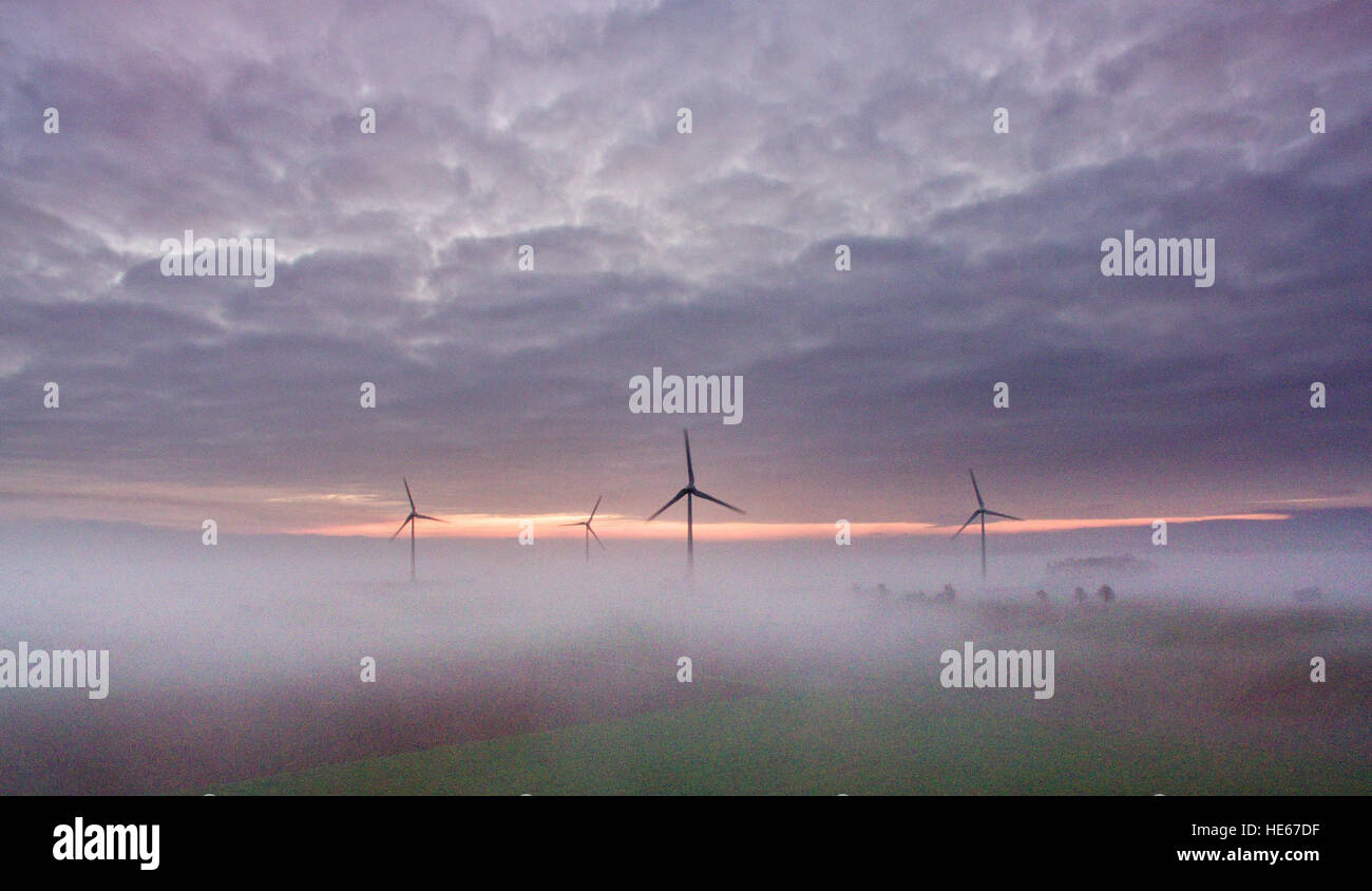 Sehnde, Germany. 19th Dec, 2016. Wind turbines in fields shrouded in ...