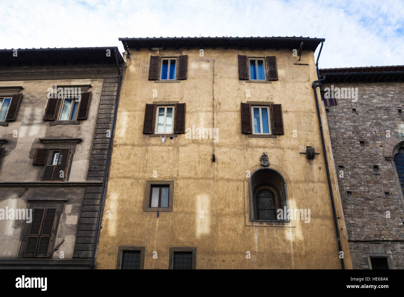 travel to Italy - facades of old apartment buildings on street in ...